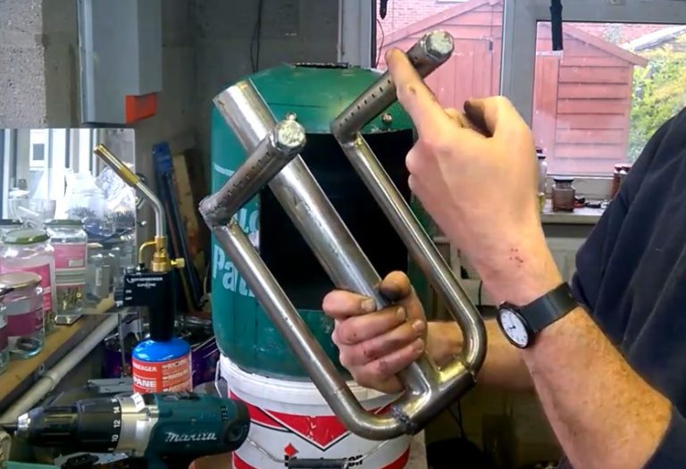 How to build a Super Efficient Outdoor Wood Stove Heater from an Old ...